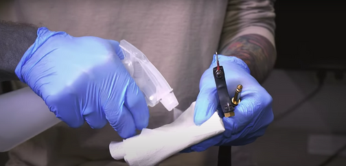 Proper cleaning and disassembly of tattoo machines, ensuring hygiene ...